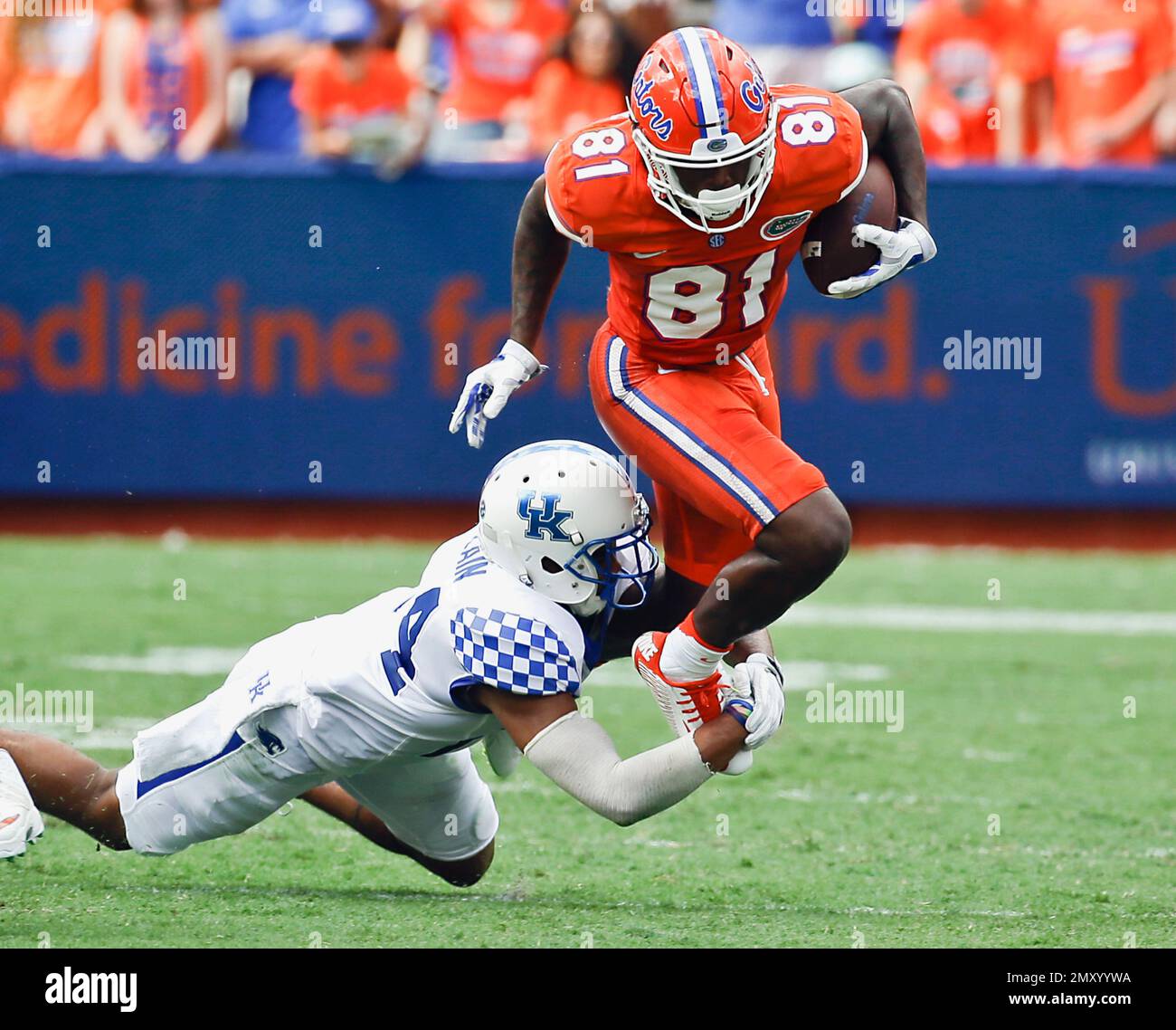 Florida wide receiver Antonio Callaway (81) is tackled by Kentucky ...