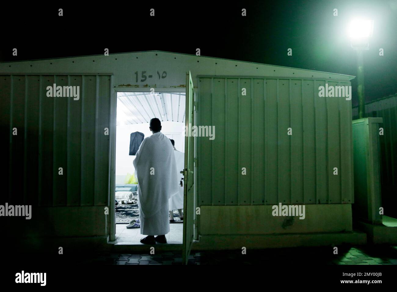 A Muslim pilgrim enters his camp after his arrival to Arafat during the ...