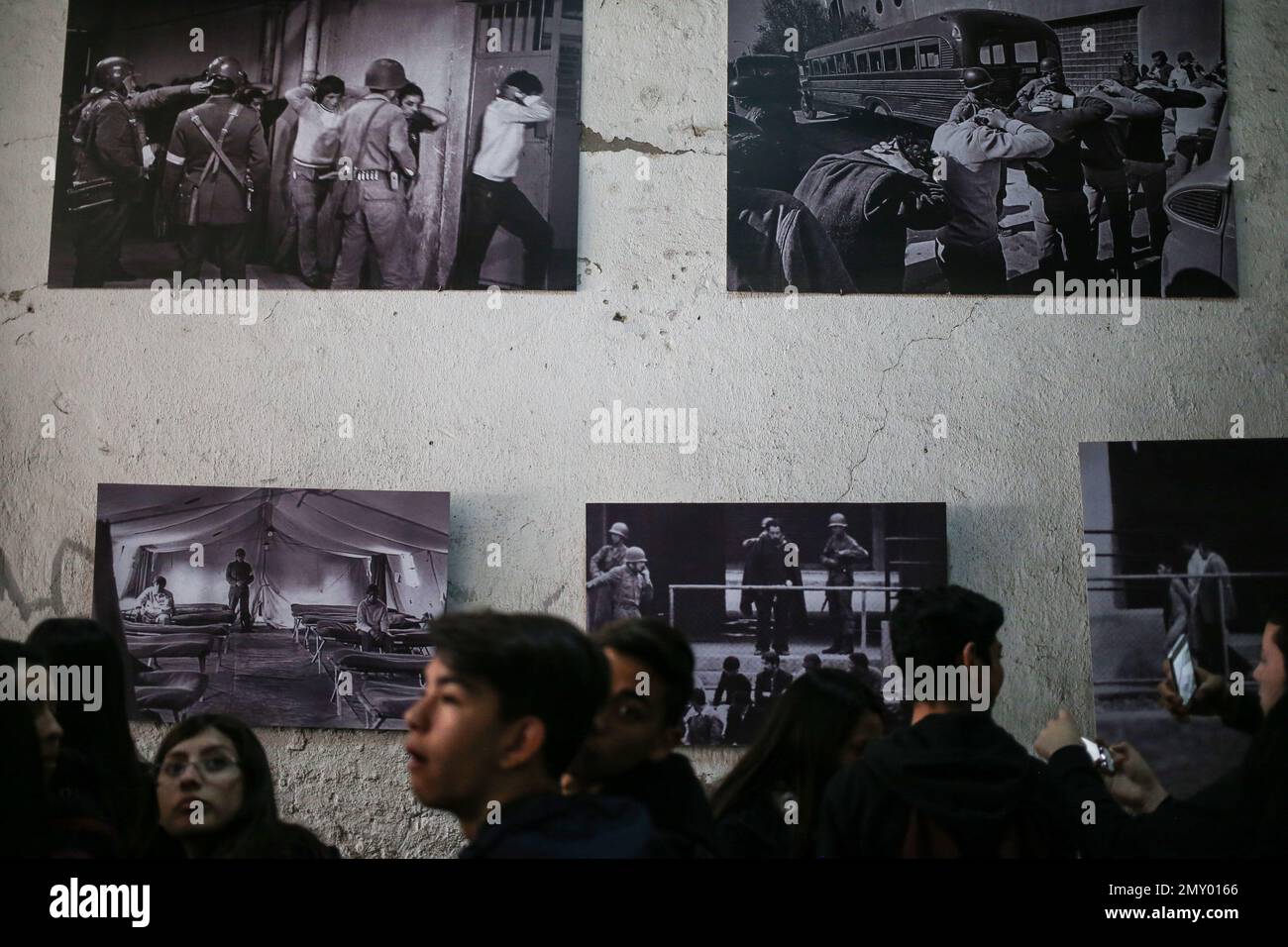 In this Sept. 8, 2016 photo, high school students visit an exhibit ...