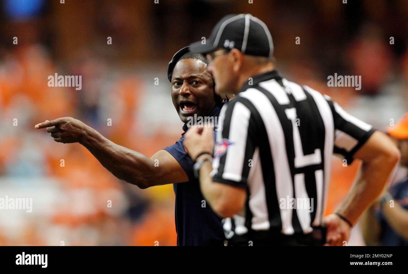 Syracuse head coach Dino Babers. left, yells at a referee upset about a ...