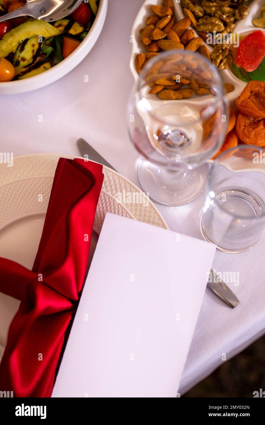 White table paper plaques on the table cafe Stock Photo - Alamy