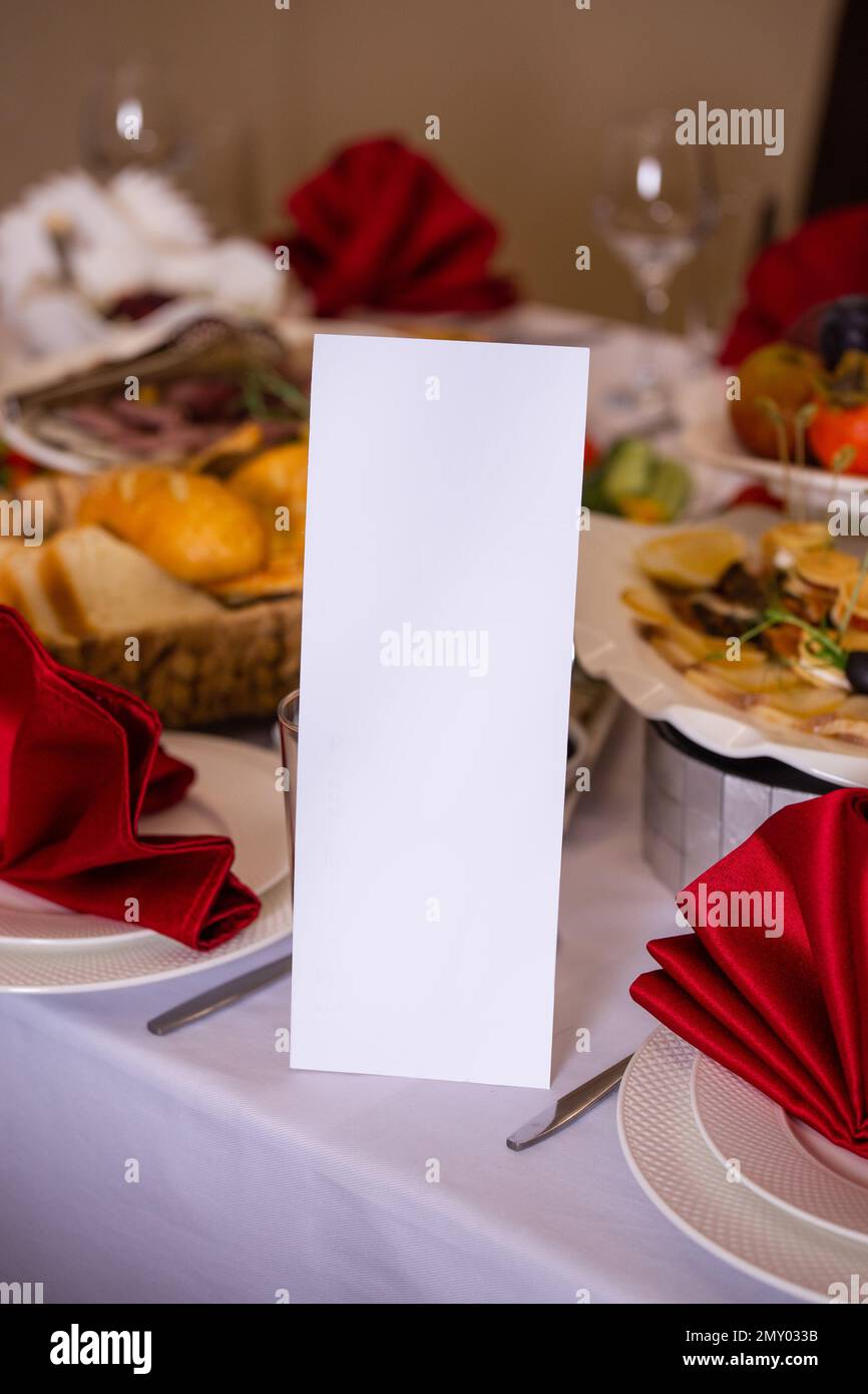 White table paper plaques on the table cafe Stock Photo - Alamy