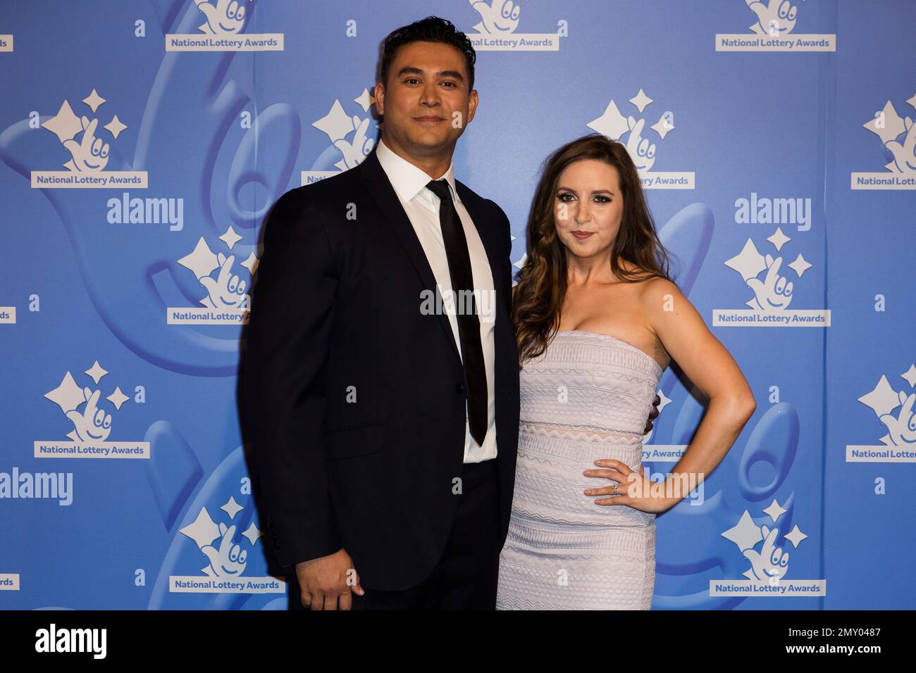 TV Presenter Rav Wilding and partner pose for photographers upon ...