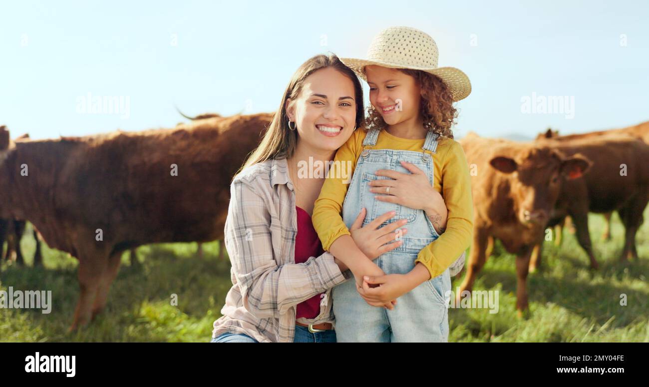 Farming, child and mother with kiss on a farm during holiday in Spain ...