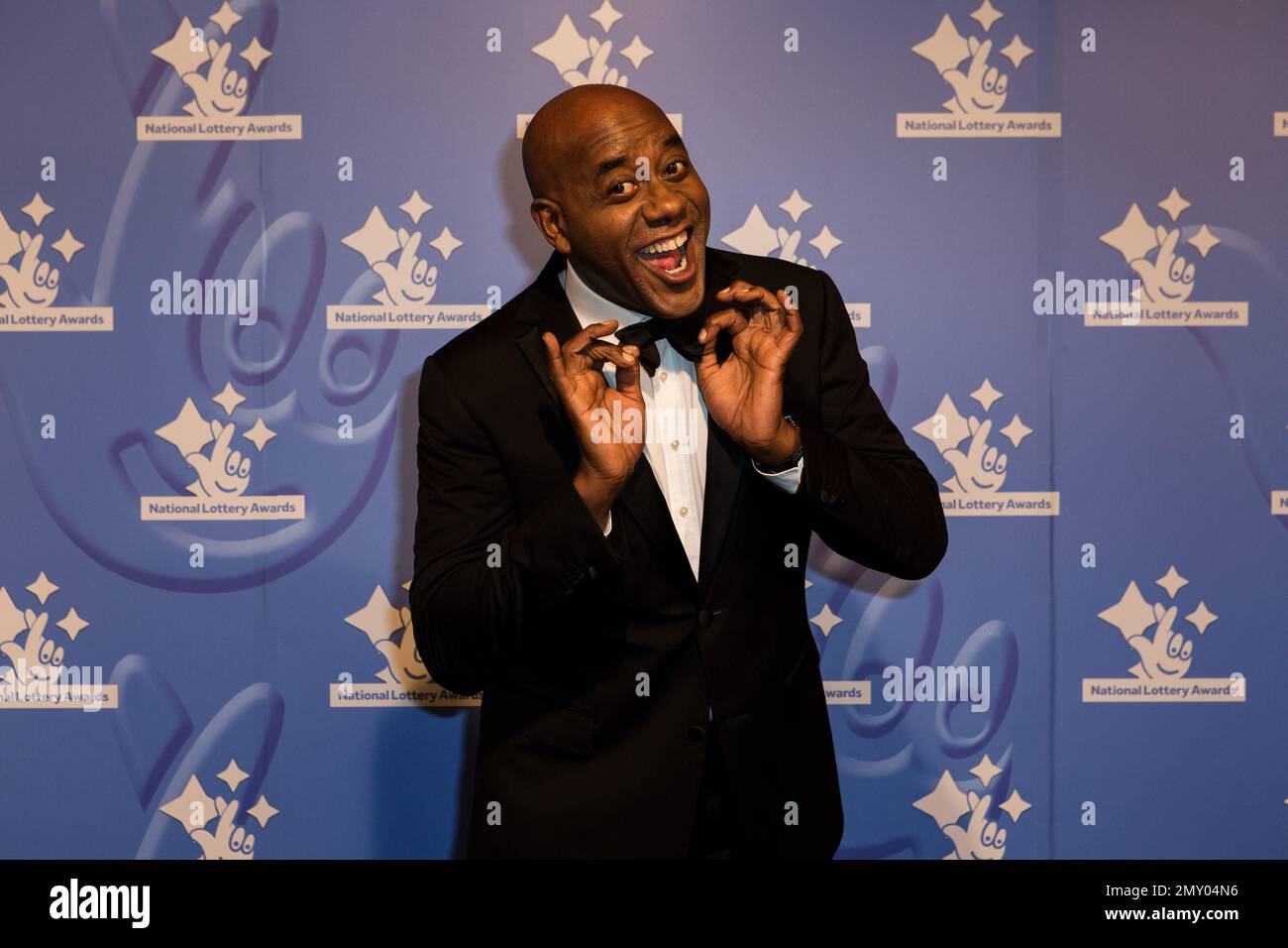TV Presenter Ainsley Harriot poses for photographers upon arrival at ...