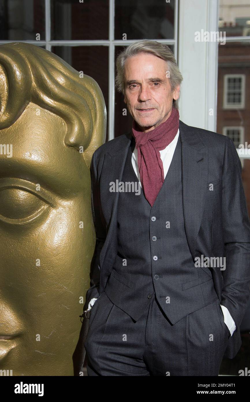 Actor Jeremy Irons poses for photographers during a BAFTA: A Life In ...