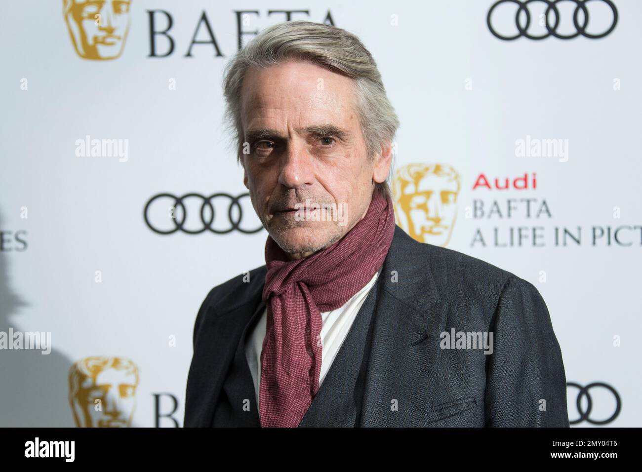 Actor Jeremy Irons poses for photographers during a BAFTA: A Life In ...