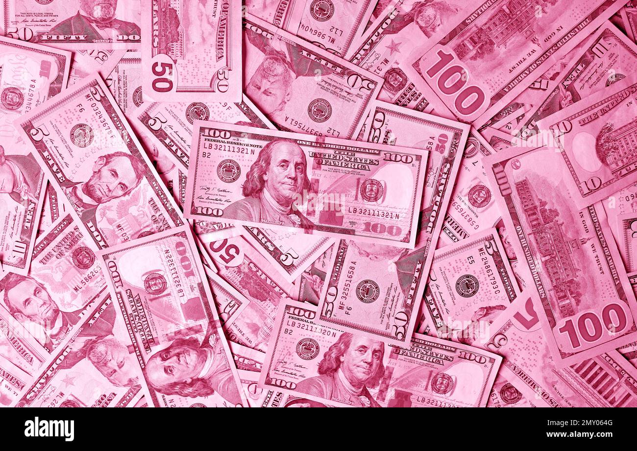 Surreal pop art style heap of magenta pink colored United States dollar ...