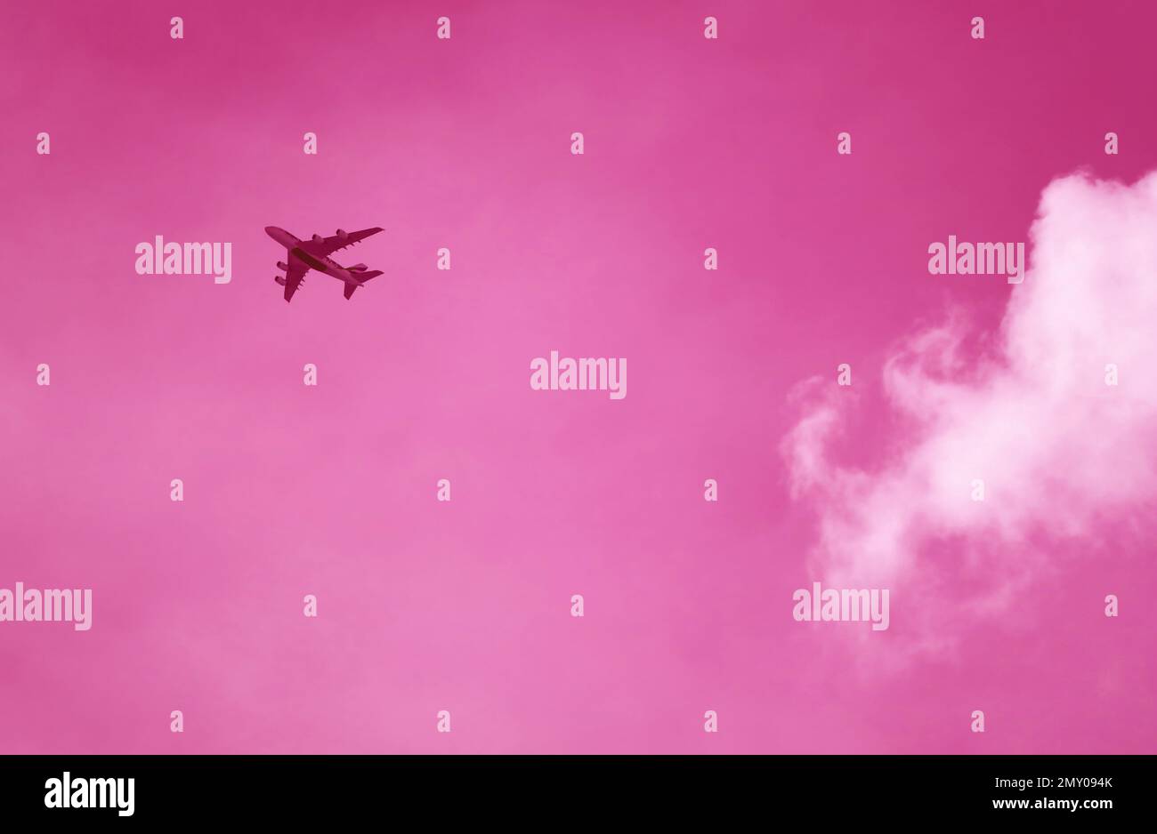 Pop art surreal image of jet plane flying on pink sky Stock Photo - Alamy