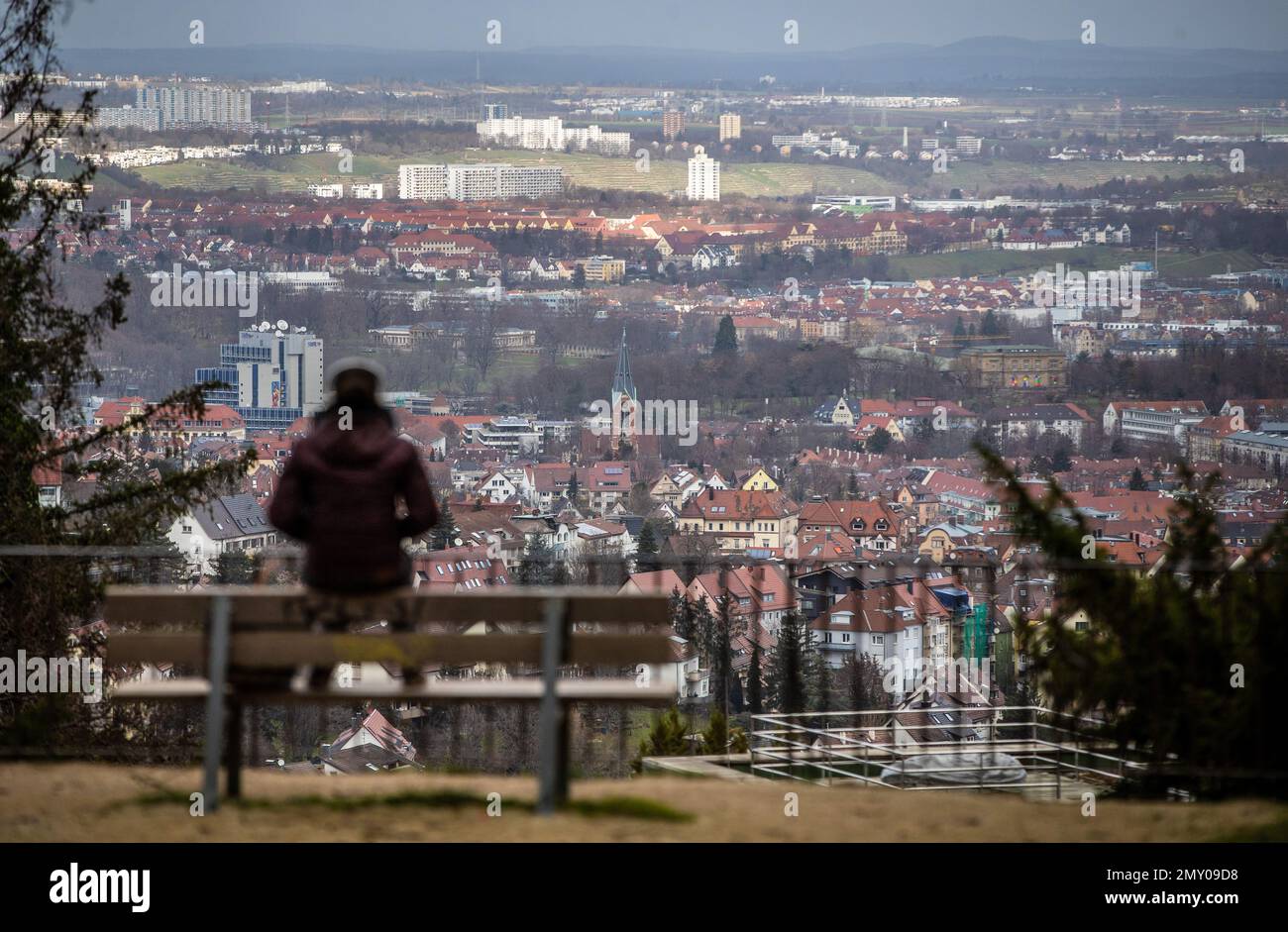 Stuttgart, Germany. 04th Feb, 2023. A woman sits on a bench at the ...