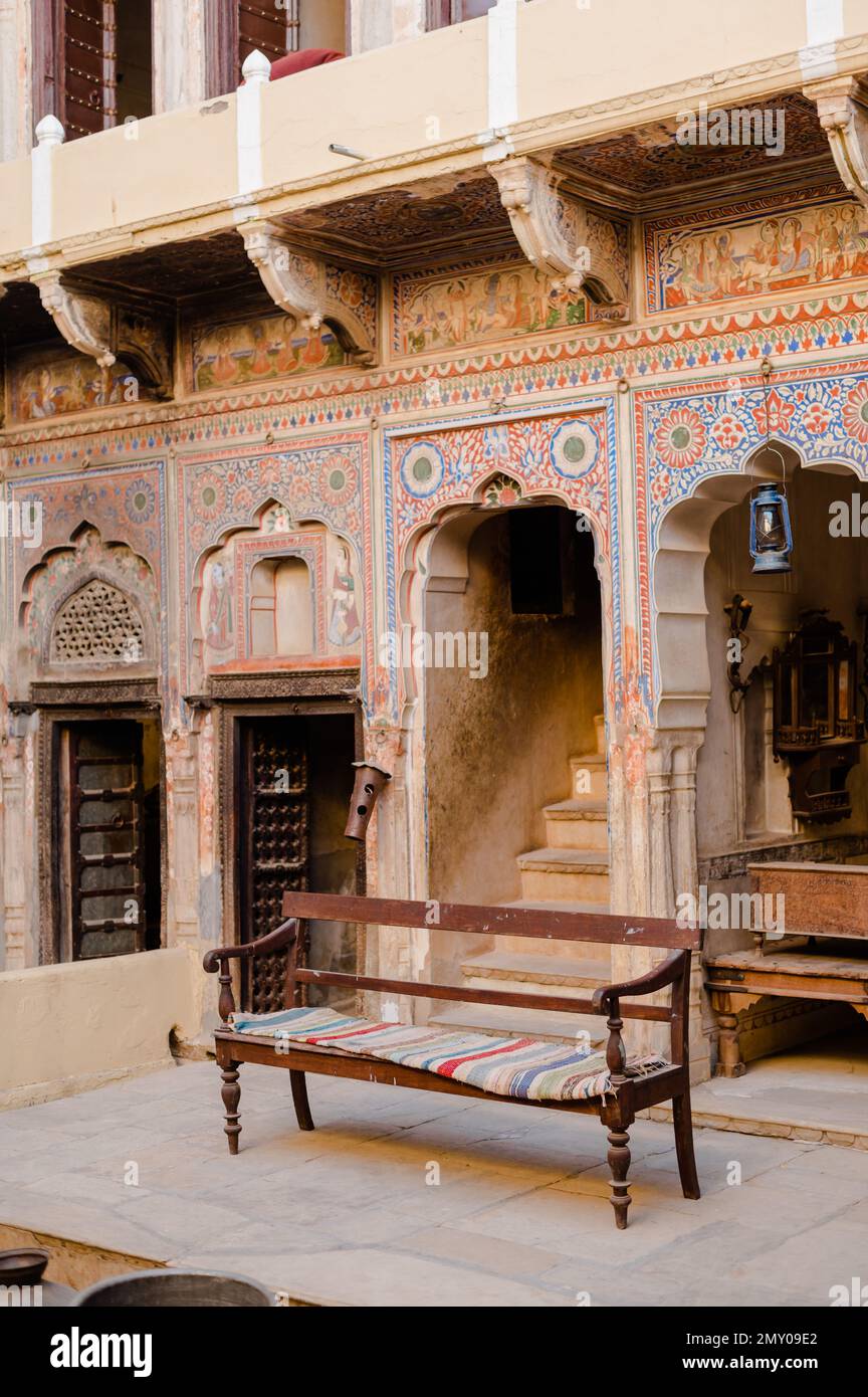 A vertical shot of the old Indian-style building with colorful patterns ...