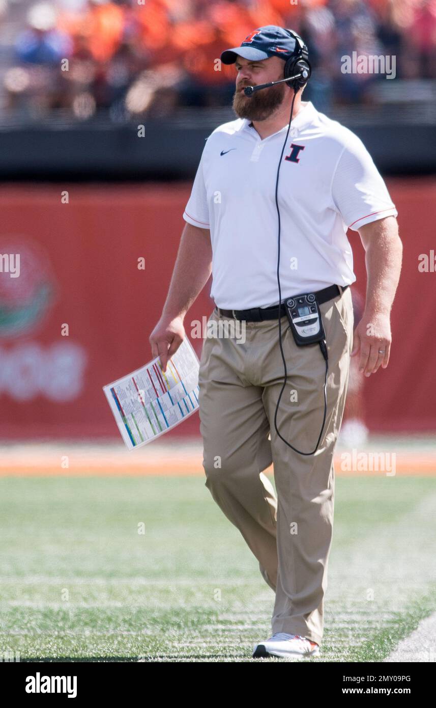 Illinois offensive line coach Luke Butkus stands on the sideline of an ...