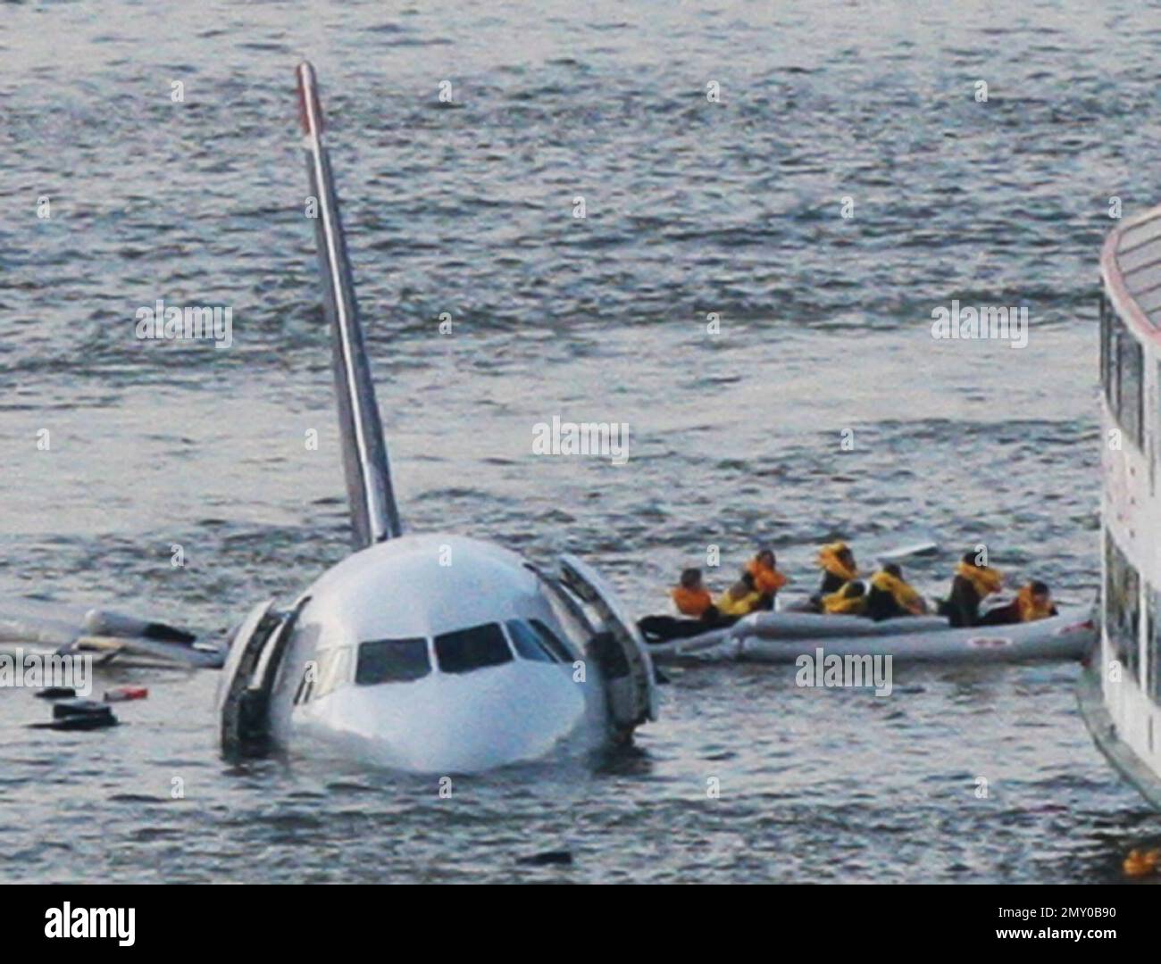 FILE - In this Jan. 15, 2009 file photo, passengers in an inflatable ...