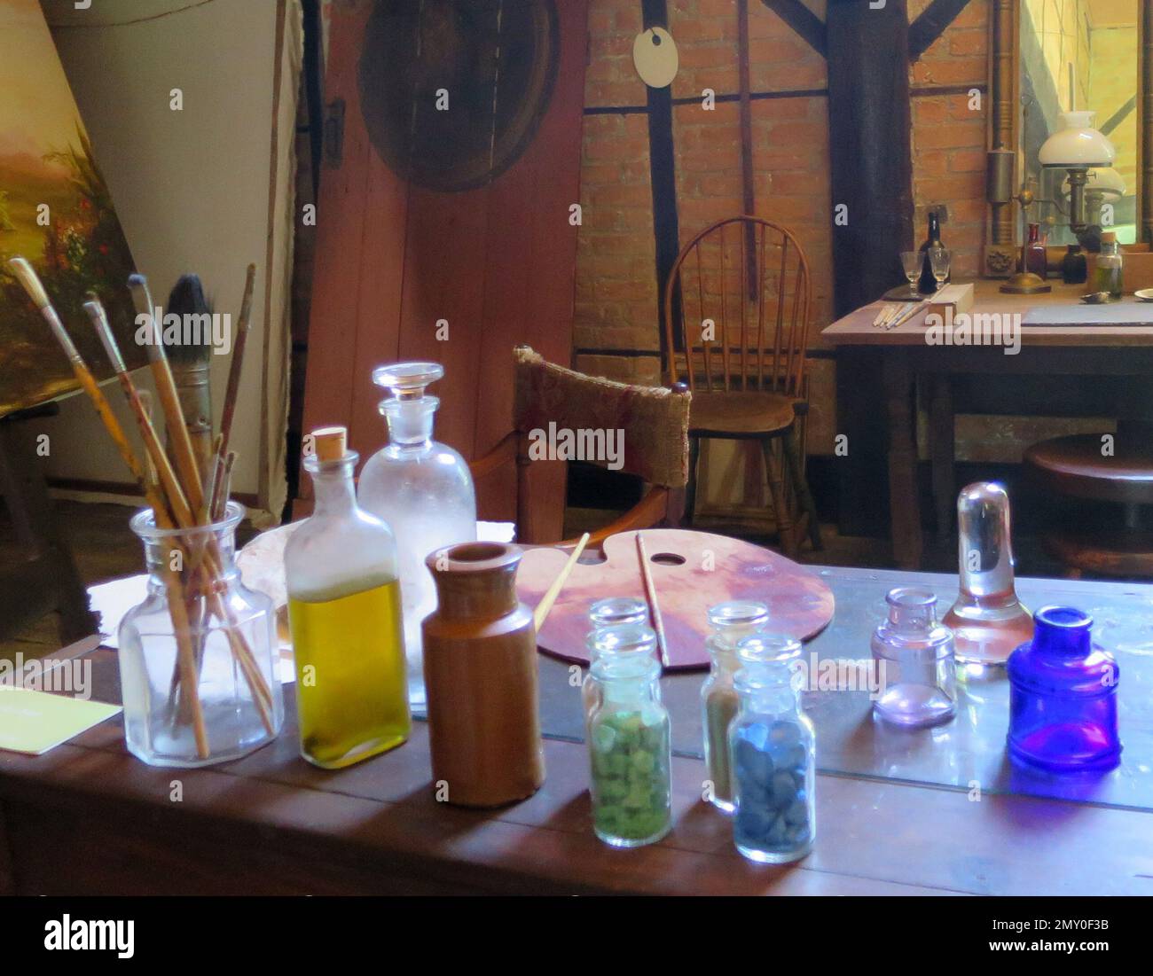 In this Aug. 20, 2016 photo, art supplies cover a table in the studio ...