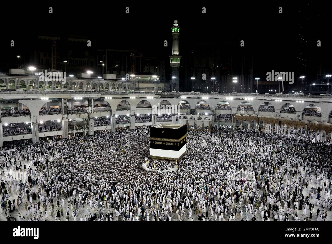 Muslim pilgrims circle the Kaaba, Islam's holiest shrine, at the Grand ...