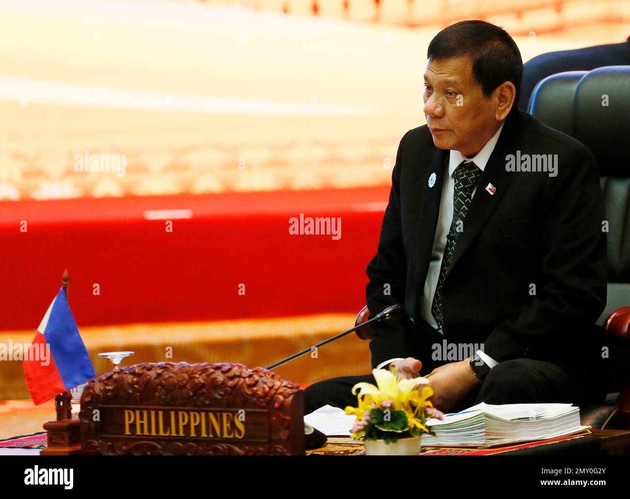Philippines' President Rodrigo Duterte sits for the retreat session in ...