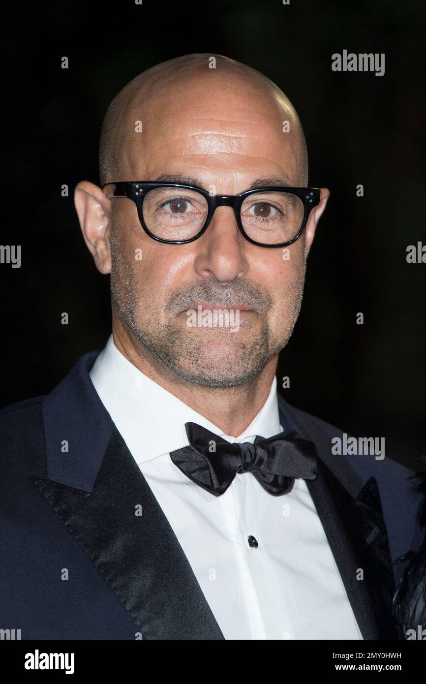Stanley Tucci poses for photographers upon arrival at the GQ magazine ...