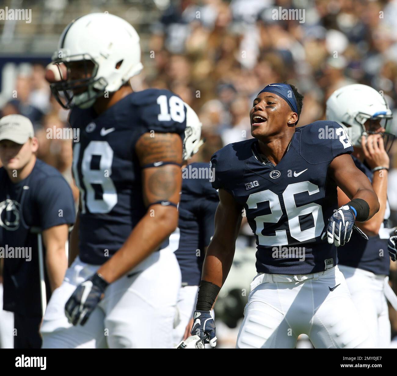 Penn State's Saquon Barkley (26) gets his teammates pumped up before ...