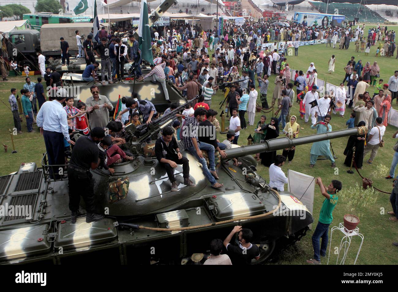 Pakistani civilians visit a military hardware exhibition to celebrate ...