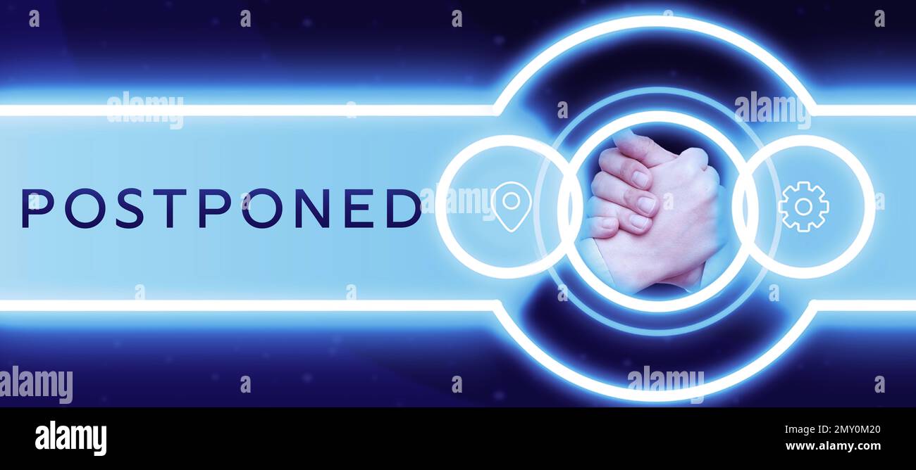 Sign displaying Postponed. Word for to place later in order of ...