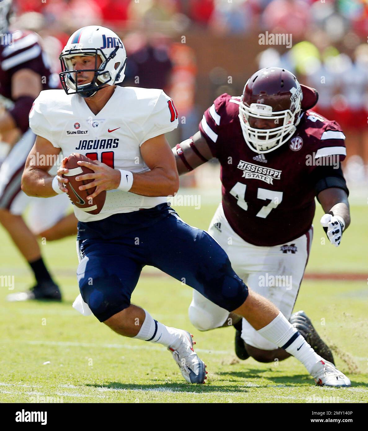 South Alabama quarterback Dallas Davis (11) is sacked by Mississippi ...
