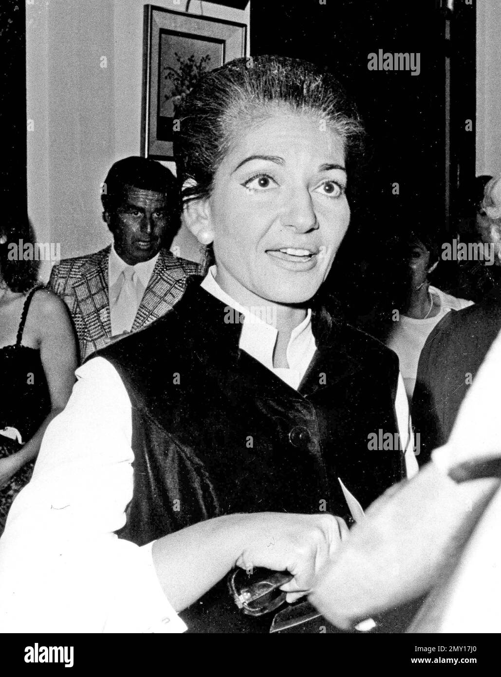 Opera singer Maria Callas talks with friends at the Theatre du Gymnase ...