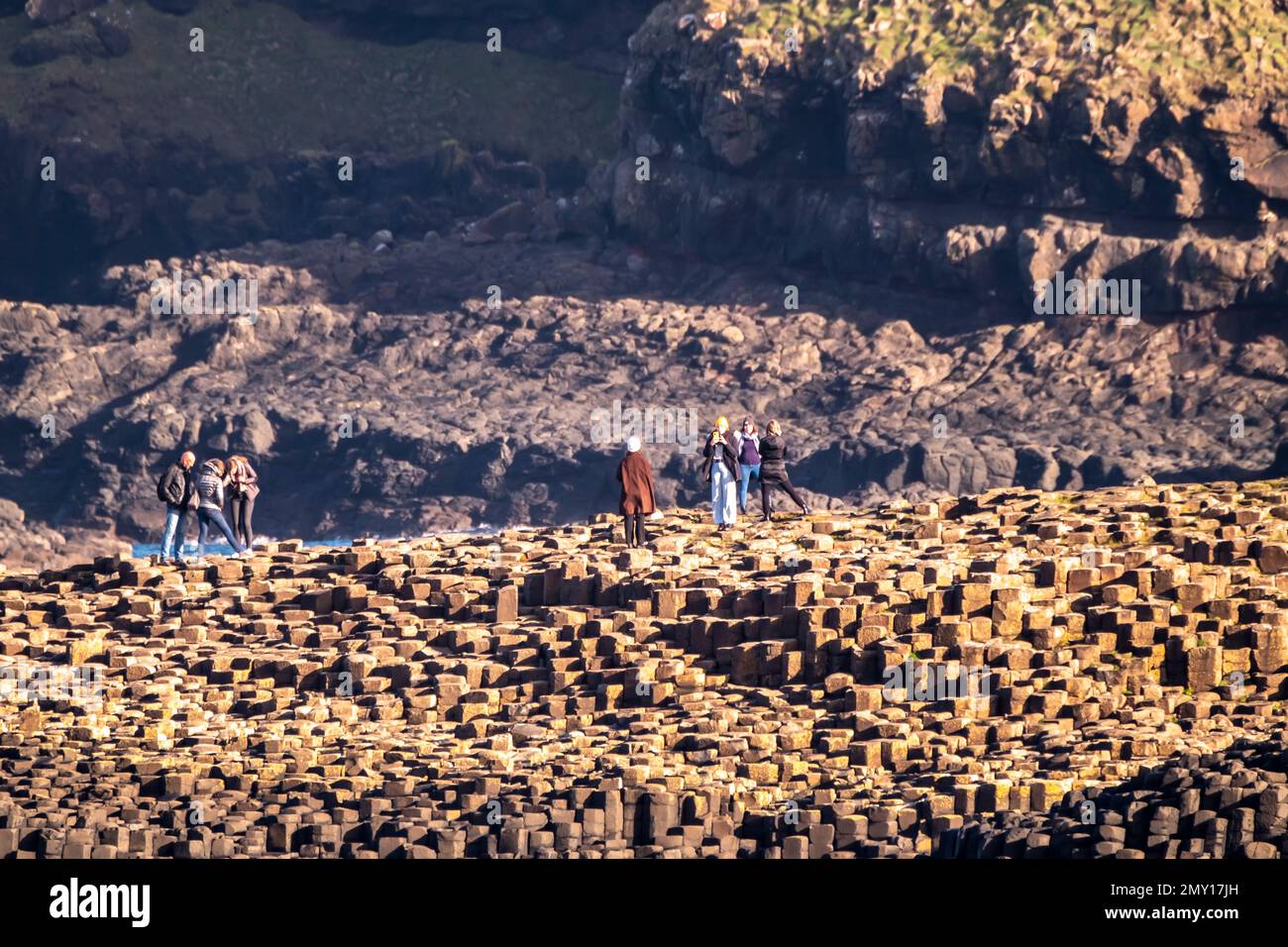 GIANT'S CAUSEWAY, NORTHERN IRELAND, UK - NOVEMBER 05 2022 : People ...
