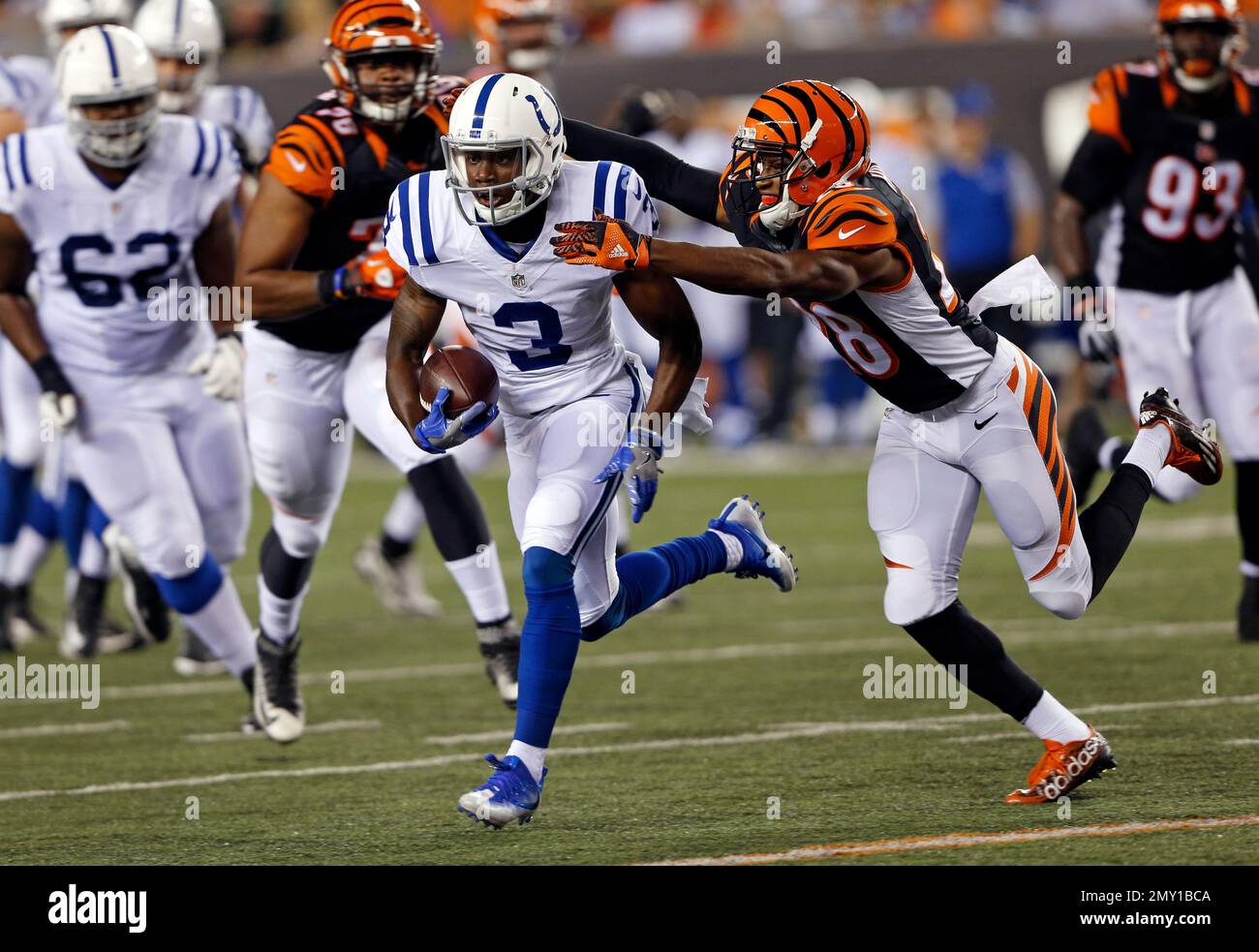 Cincinnati Bengals cornerback Darius Hillary (28) dives to tackle ...