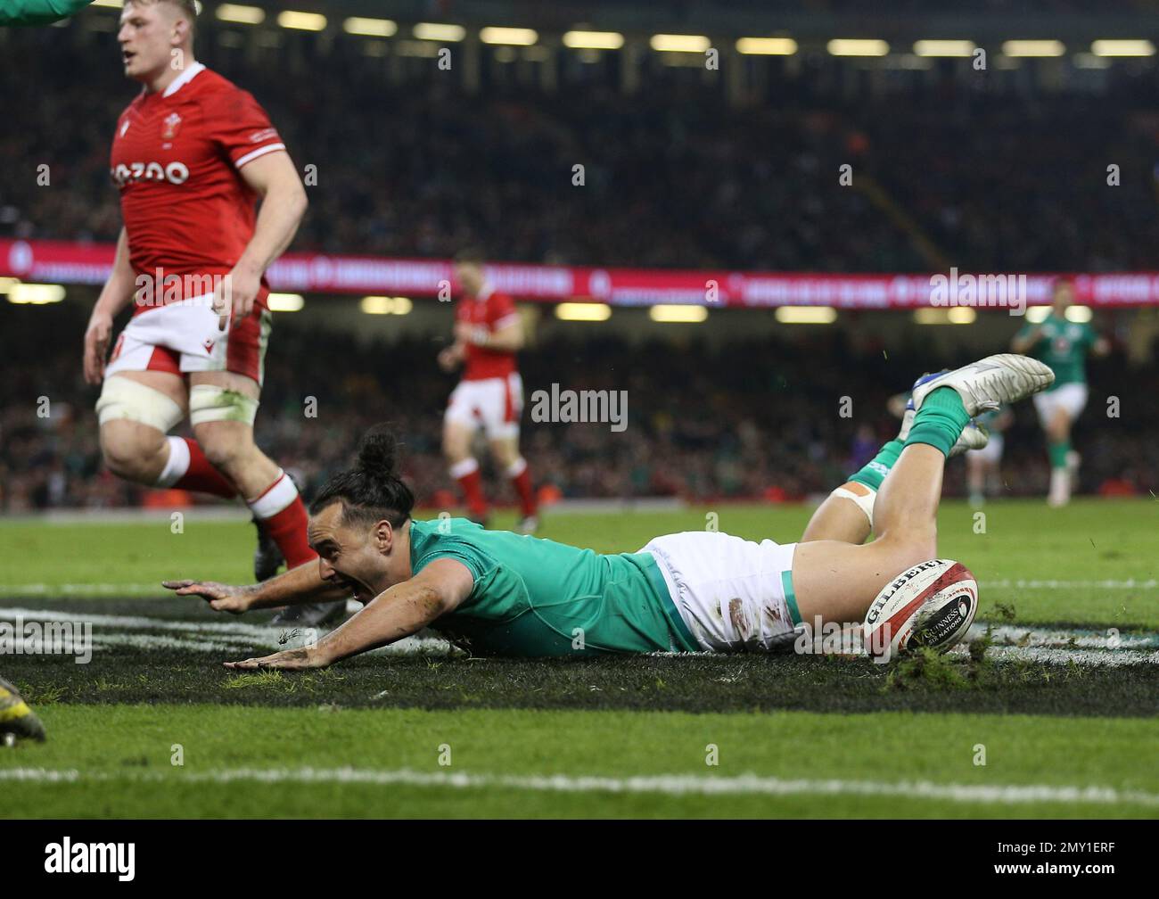 Ireland's James Lowe scores their side's third try during the Guinness ...