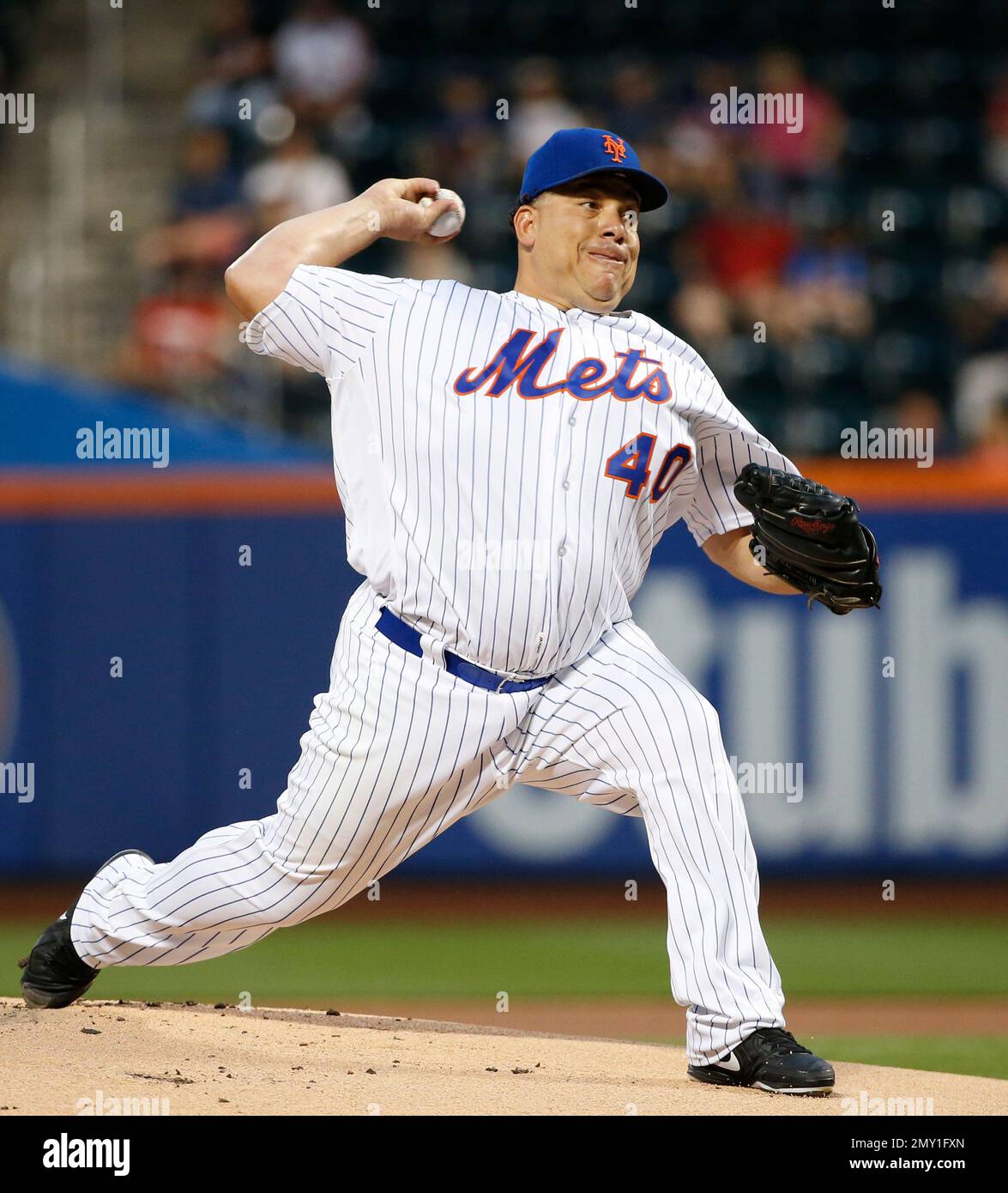 New York Mets starting pitcher Bartolo Colon (40) delivers in the first ...