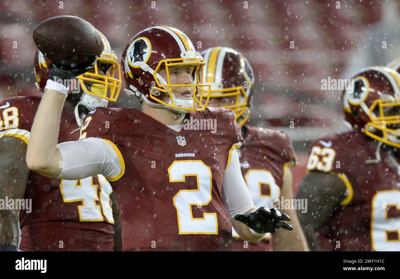 Washington Redskins quarterback Nate Sudfeld (2) warms up before the ...