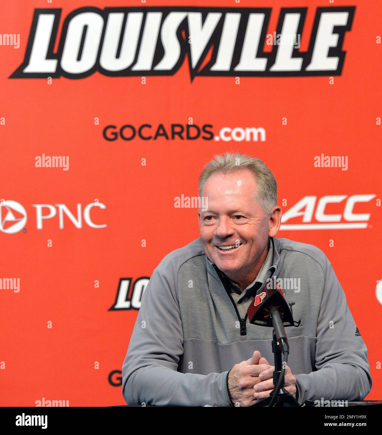 Louisville head football coach Bobby Petrino responds to a question ...