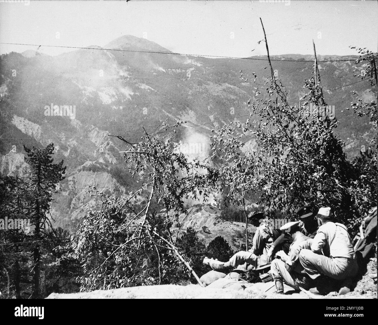 Greek Nationalist soldiers and U.S. military observers watch an assault ...