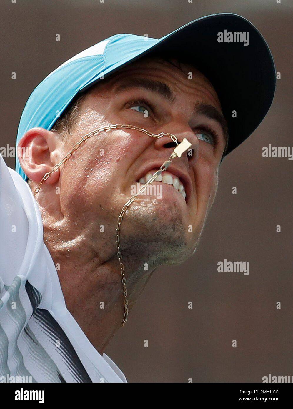 Vasek Pospisil, of Canada, serves to Kevin Anderson, of South Africa ...