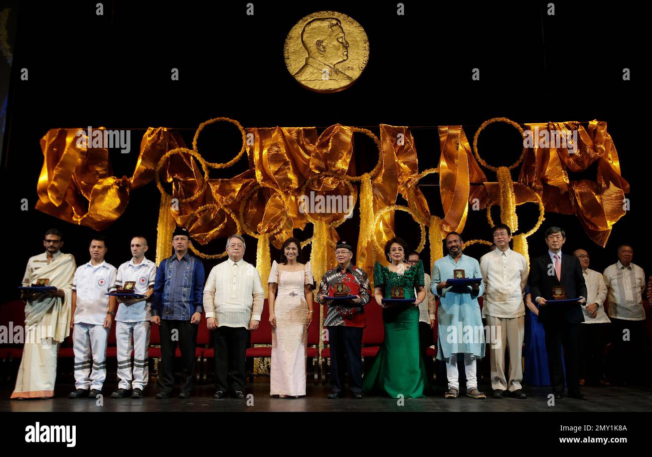Philippine Vice President Leni Robredo, center, poses with 2016 Ramon ...