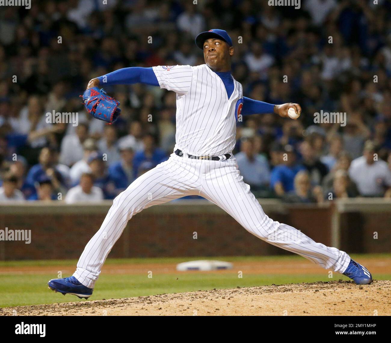 Chicago Cubs relief pitcher Aroldis Chapman delivers during the ninth ...