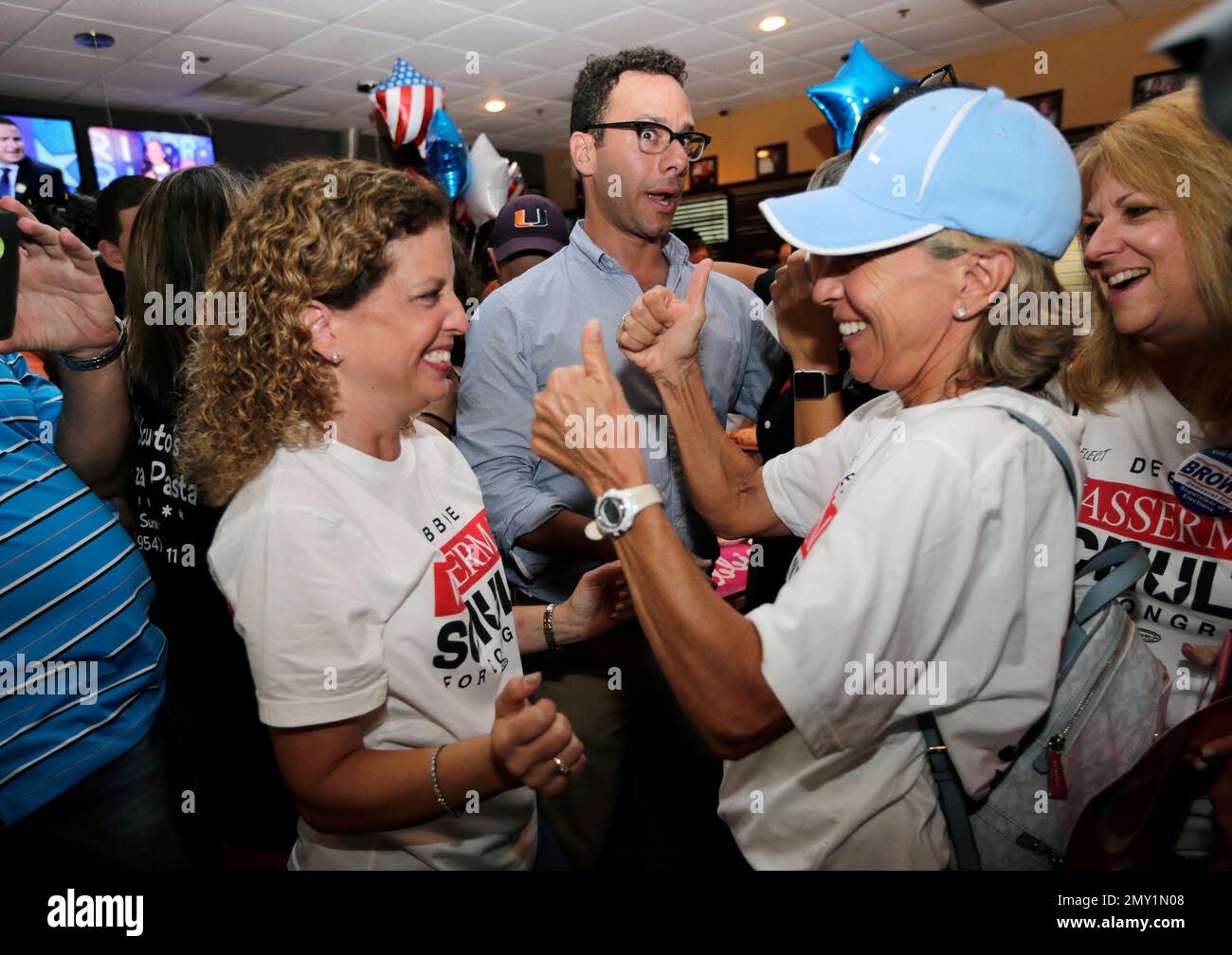 Rep. Debbie Wasserman Schultz, D-Fla., left, arrives for an event with ...