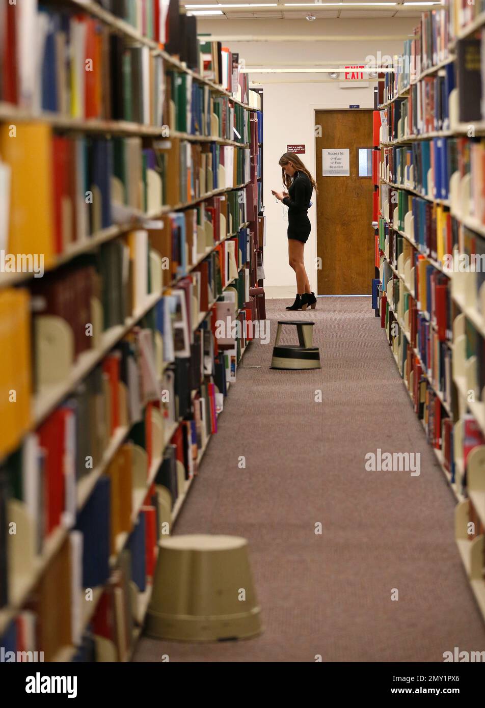A student checks her phone in the classic area of the renovated James ...
