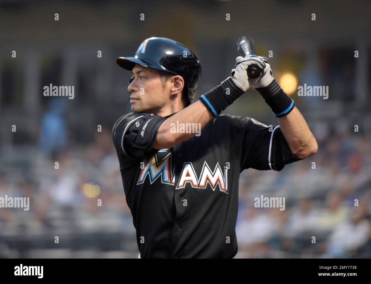 Miami Marlins' Ichiro Suzuki prepares to bat during the first inning of ...