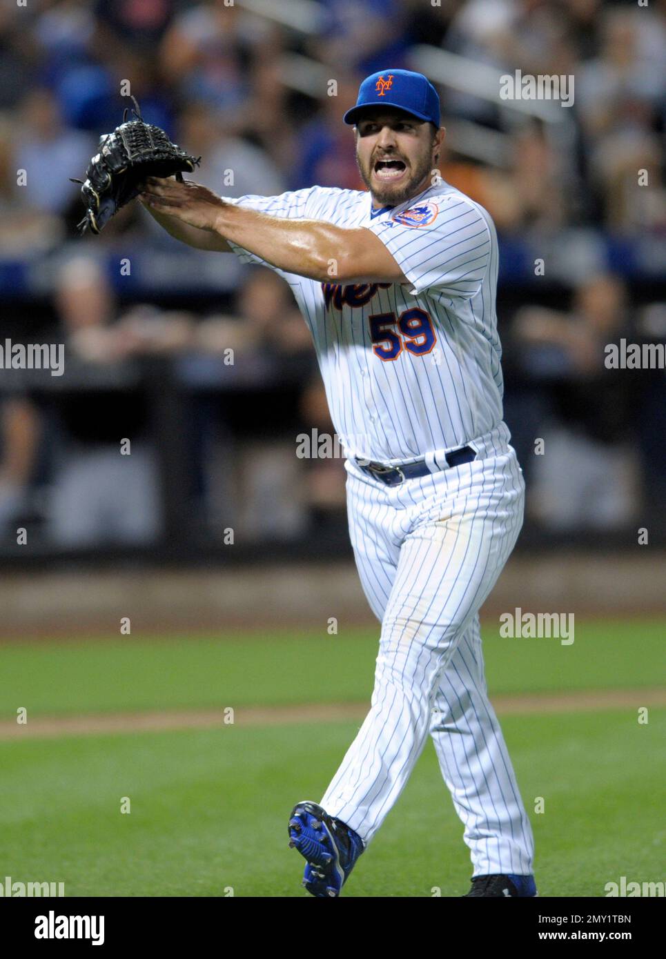 New York Mets pitcher Josh Smoker reacts after striking out Miami ...