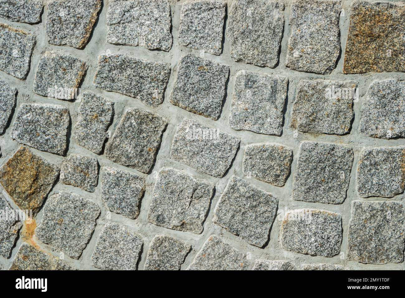 Street with gray cobblestone texture Stock Photo - Alamy