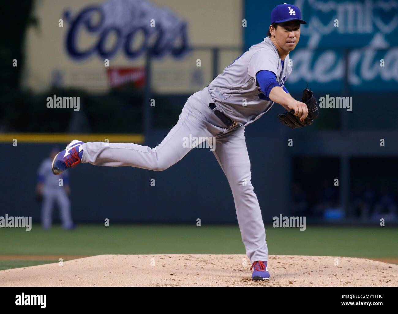 Los Angeles Dodgers starting pitcher Kenta Maeda delivers a pitch to ...