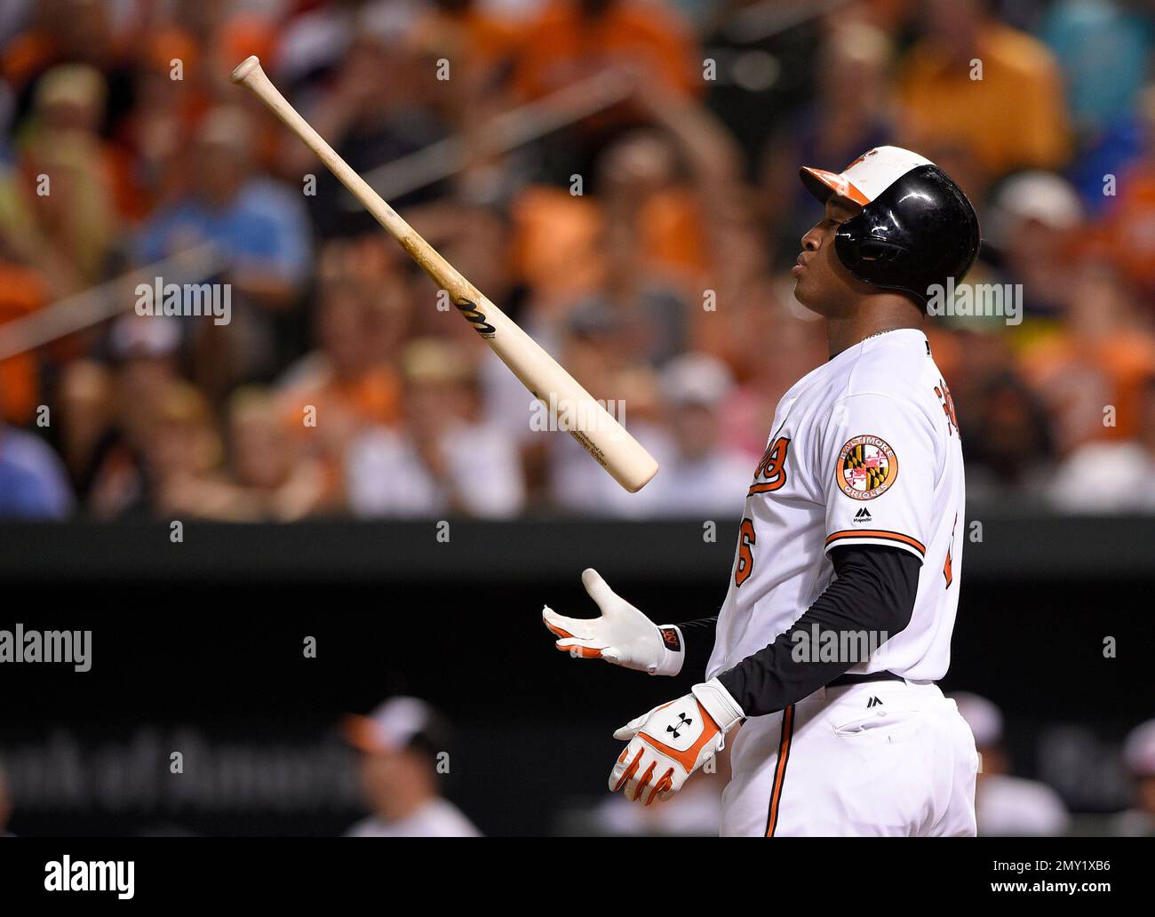 Baltimore Orioles' Jonathan Schoop flips his bat during a baseball game ...