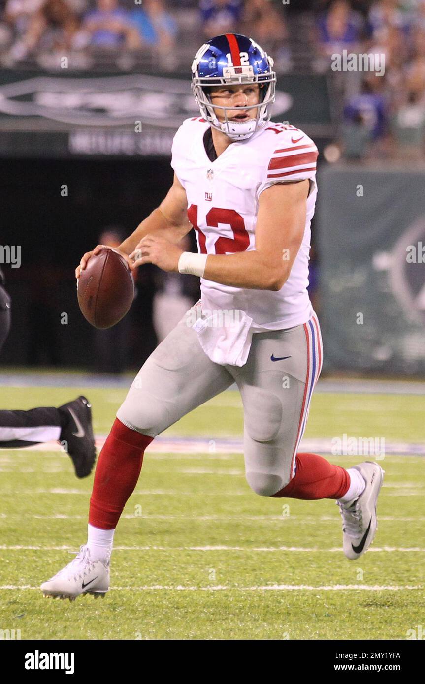 New York Giants quarterback Ryan Nassib (12) runs with the ball against ...