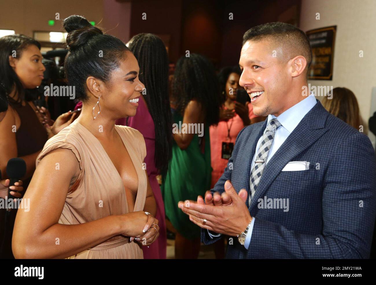 Regina Hall, left, and Theo Rossi attend the Screen Gems premiere of ...