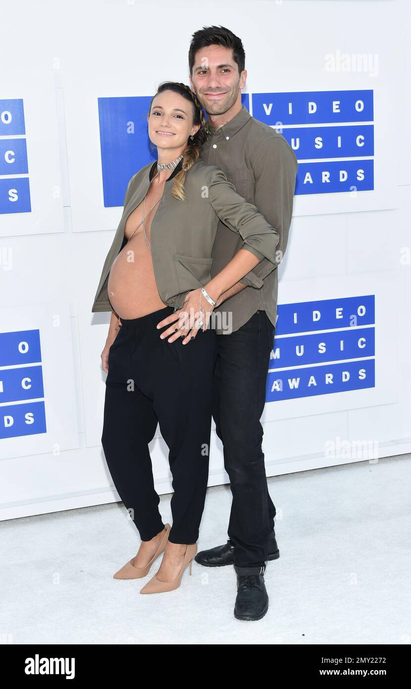 Laura Perlongo, left, and Nev Schulman arrive at the MTV Video Music ...