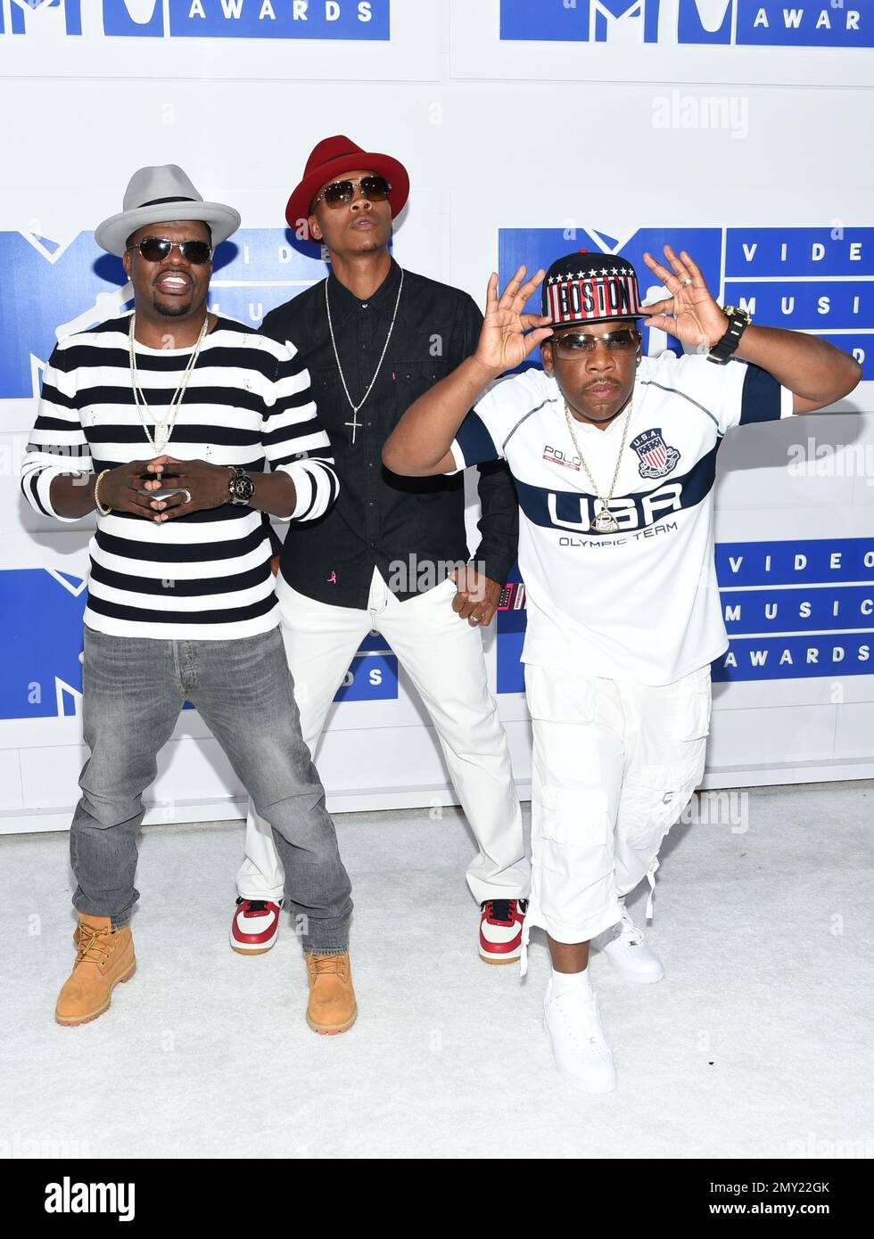 From left, Ricky Bell, Ronnie DeVoe, and Michael Bivins of New Edition ...