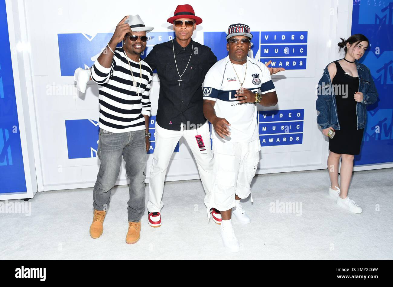 From left, Ricky Bell, Ronnie DeVoe, and Michael Bivins of New Edition ...