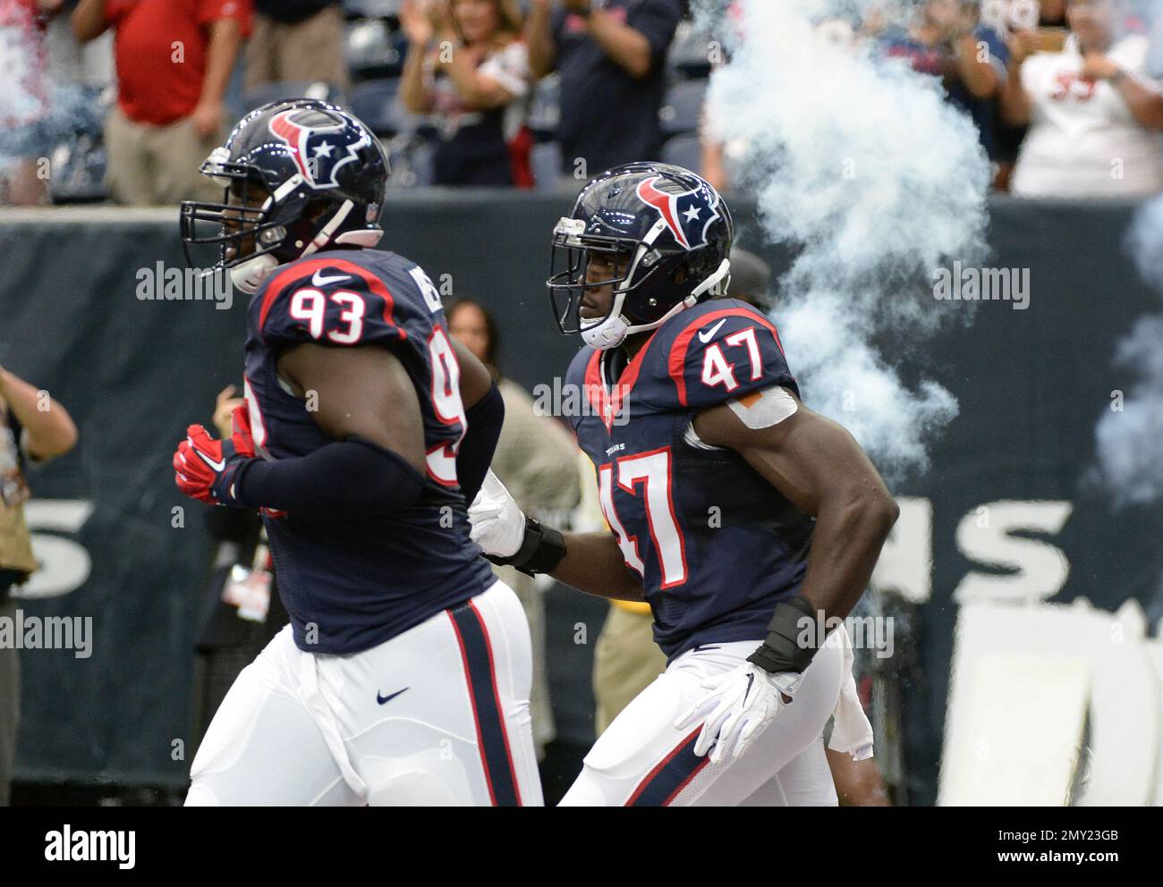 Houston Texans defensive tackle Joel Heath (93) and Soma Vainuku (47 ...