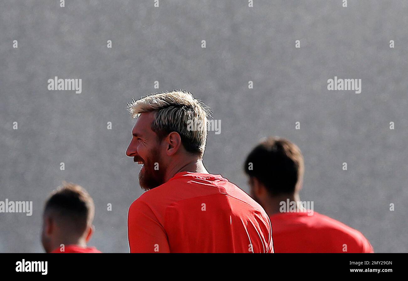 FC Barcelona's Lionel Messi smiles during a training session at the ...